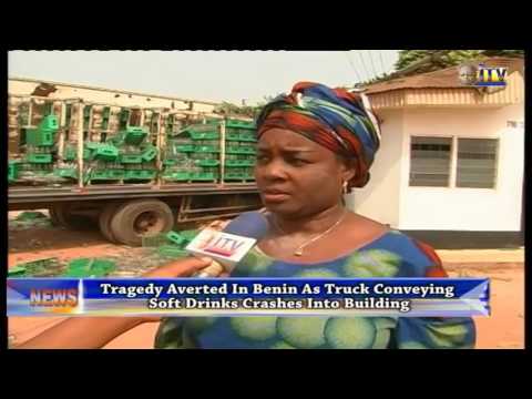 Tragedy Averted In Benin As Truck Conveying Soft Drinks Crashes Into Building