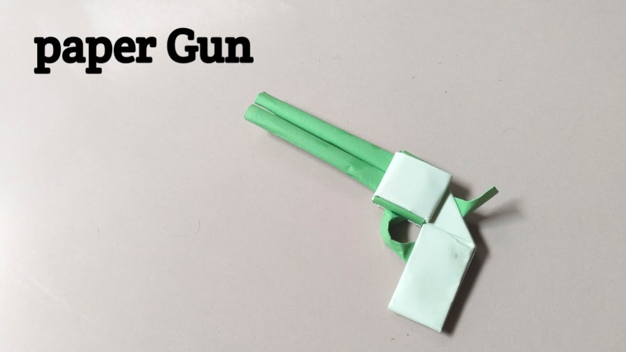 How to make bullet shooting mini gun from a4 paper | paper gun tutorial ...