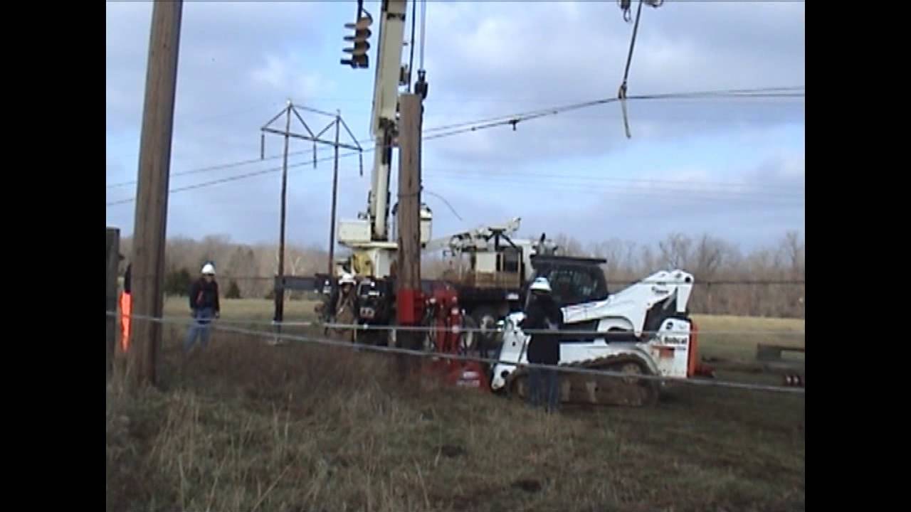 EZ Spot UR Pole Puller on Bobcat T870 - YouTube