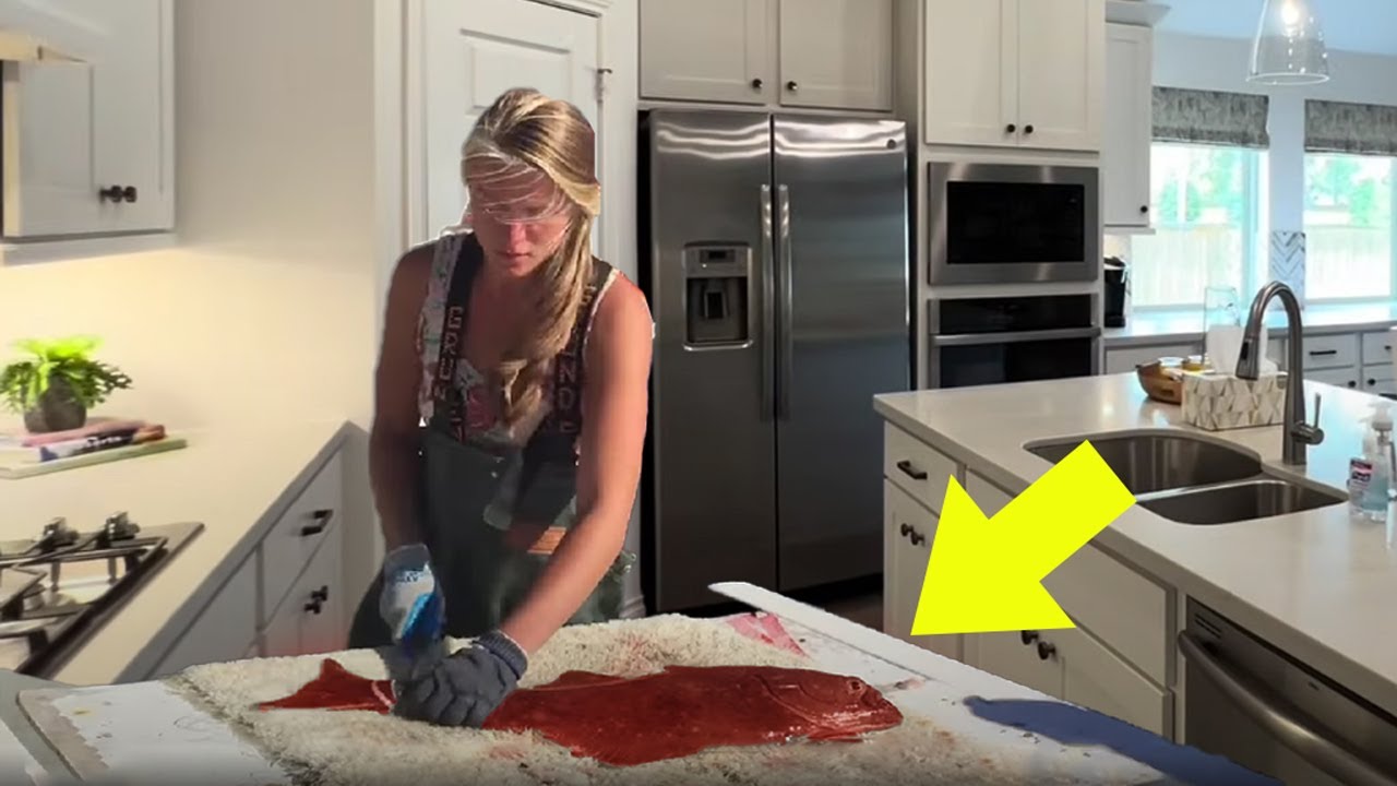 Woman Cleaning Out a Fish for Dinner Gets the Surprise of Her Life ...