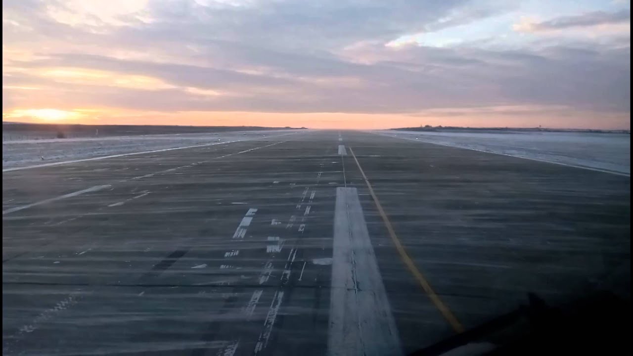 low drifting snow on runway - YouTube
