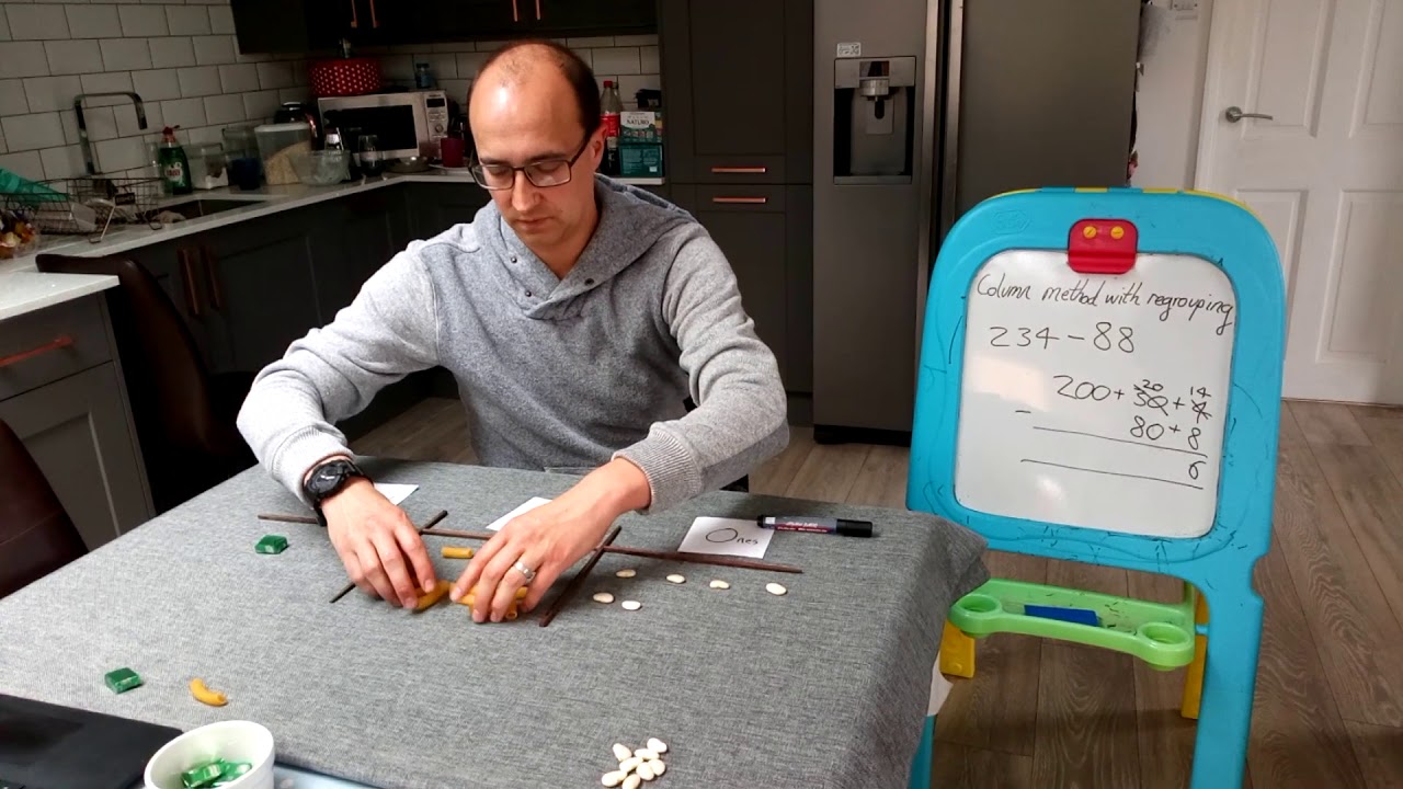 KS2 Column method with regrouping Concrete - YouTube