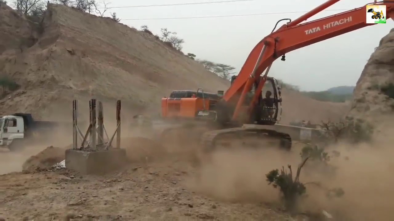 Amazing stunt video Excavator - YouTube