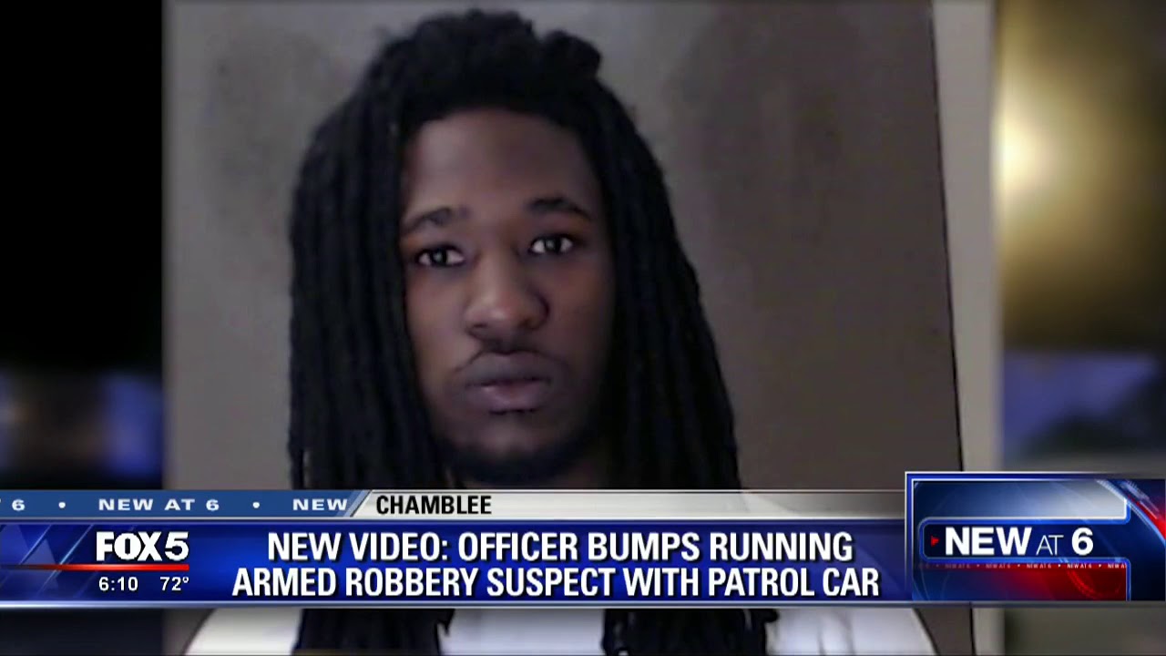 Video shows officer bumping running armed robbery suspect - YouTube