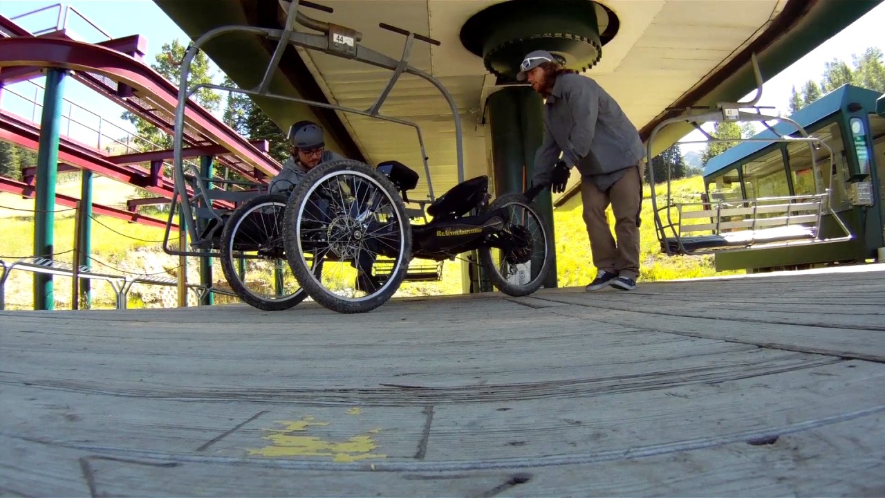 Loading a Reactive Adaptation's Bomber off road hand cycle - YouTube