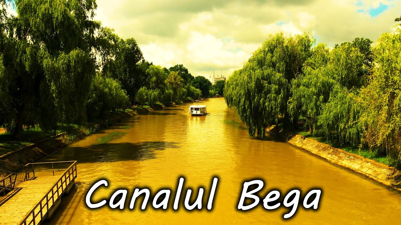 The Bega Canal with bridges, and historical buildings from the central ...