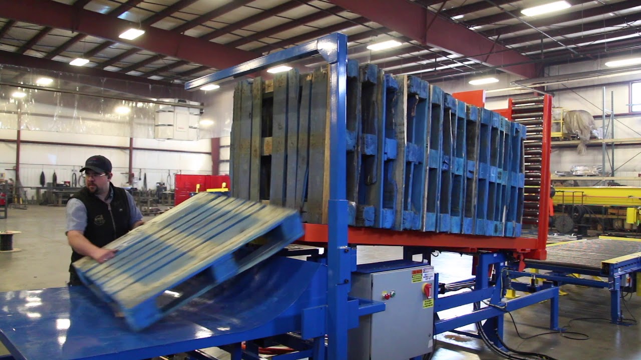 Tipper Pallet Dispenser with Swoop Table - YouTube
