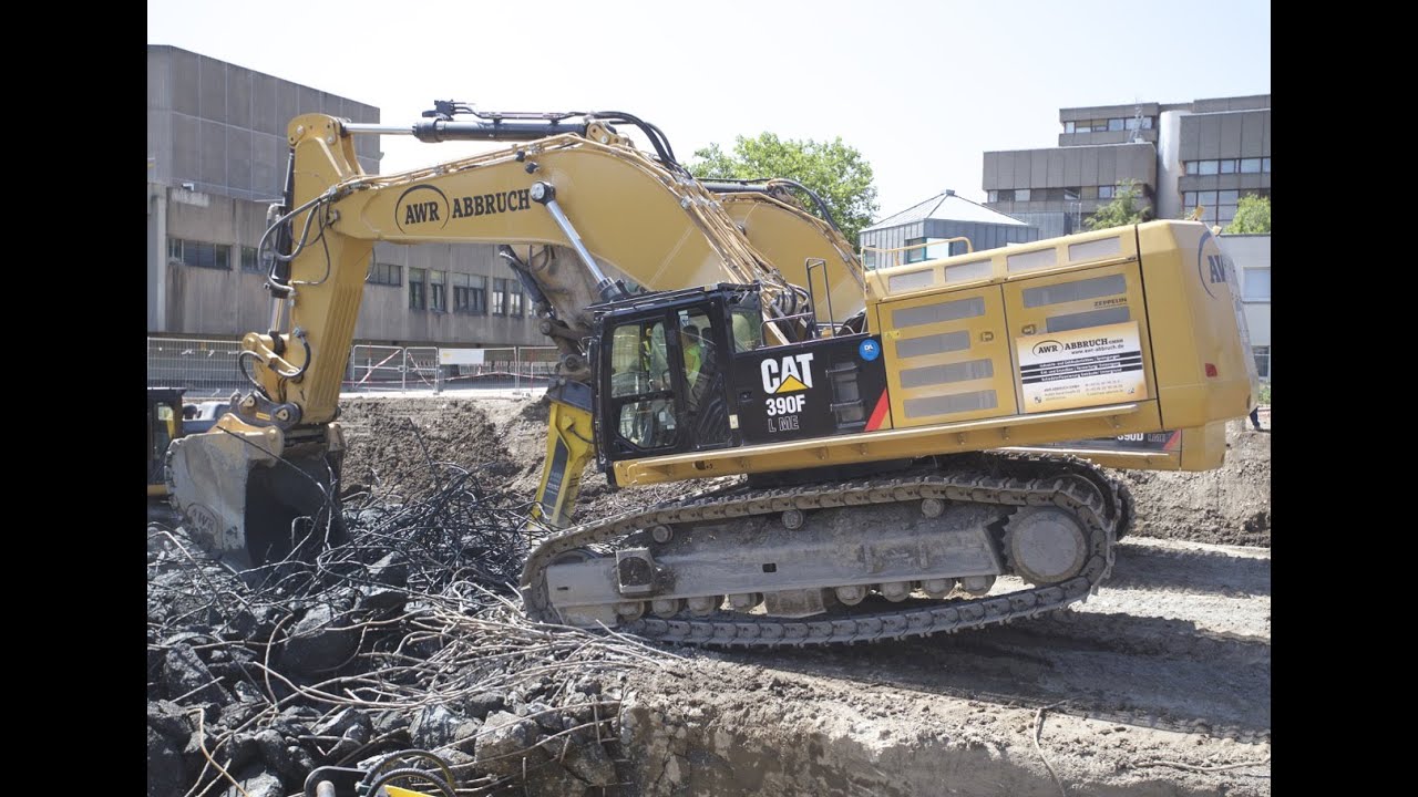 Cat 390 F LME mit Oil Quick 120 kämpft gegen Fundament - YouTube