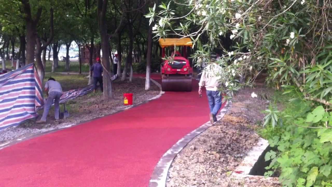 Coloured bitumen (asphalt) - YouTube