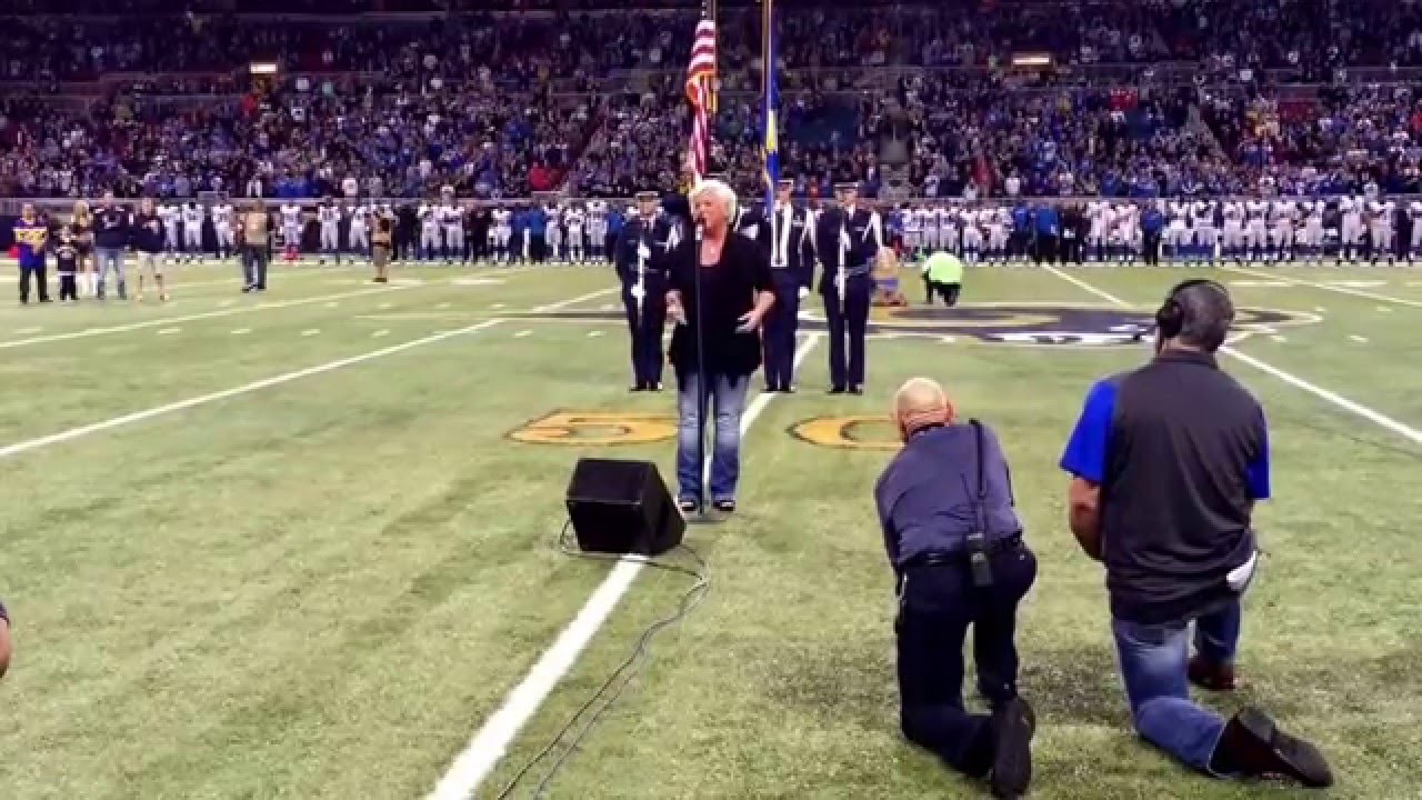 Melanie Dennison singing the national anthem at the Rams / Lions game ...