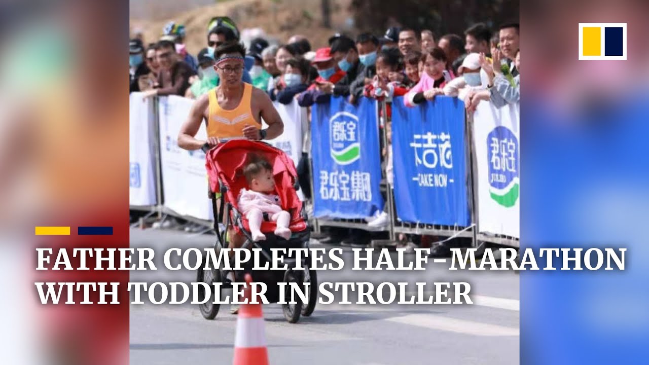 Chinese father finishes half-marathon while pushing daughter in ...