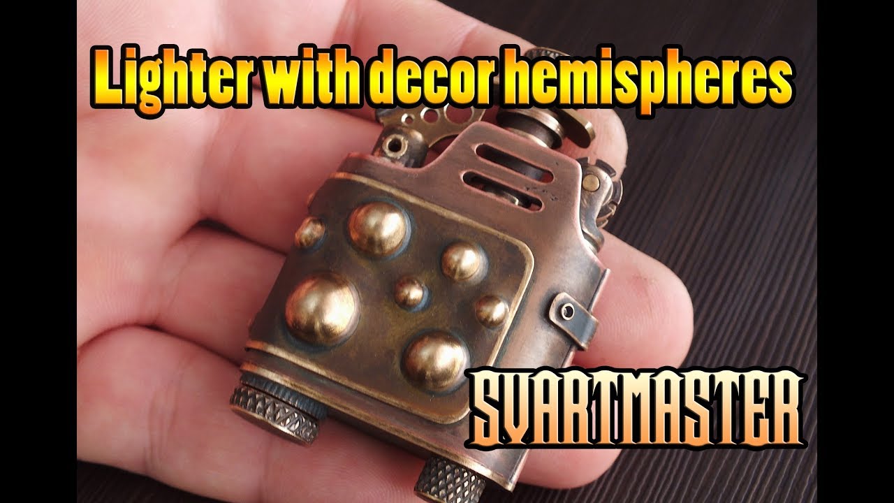 Gasoline lighter made in steampunk stylization with decor hemispheres ...