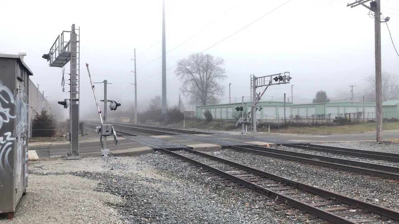 NS 1801 leads as GMTX 2203 trails last on NS 171 pass Maple St in ...