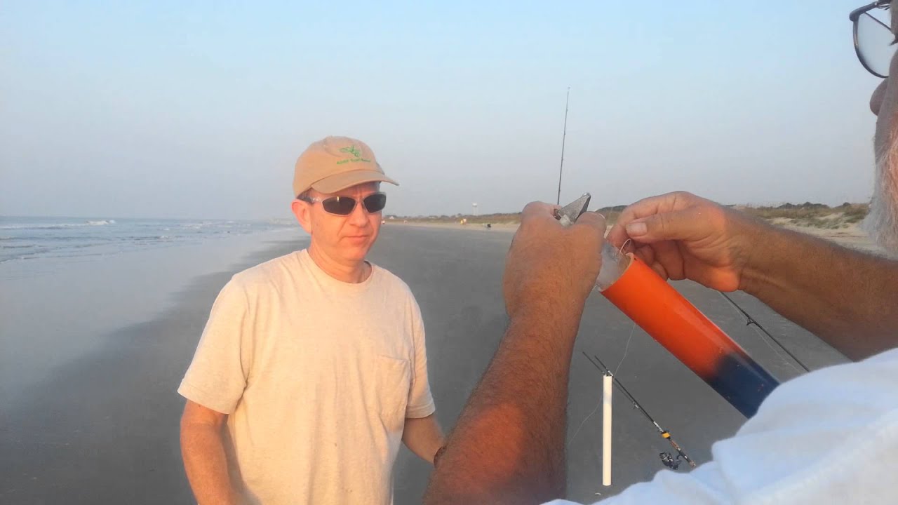 Family using home made bait launcher - YouTube