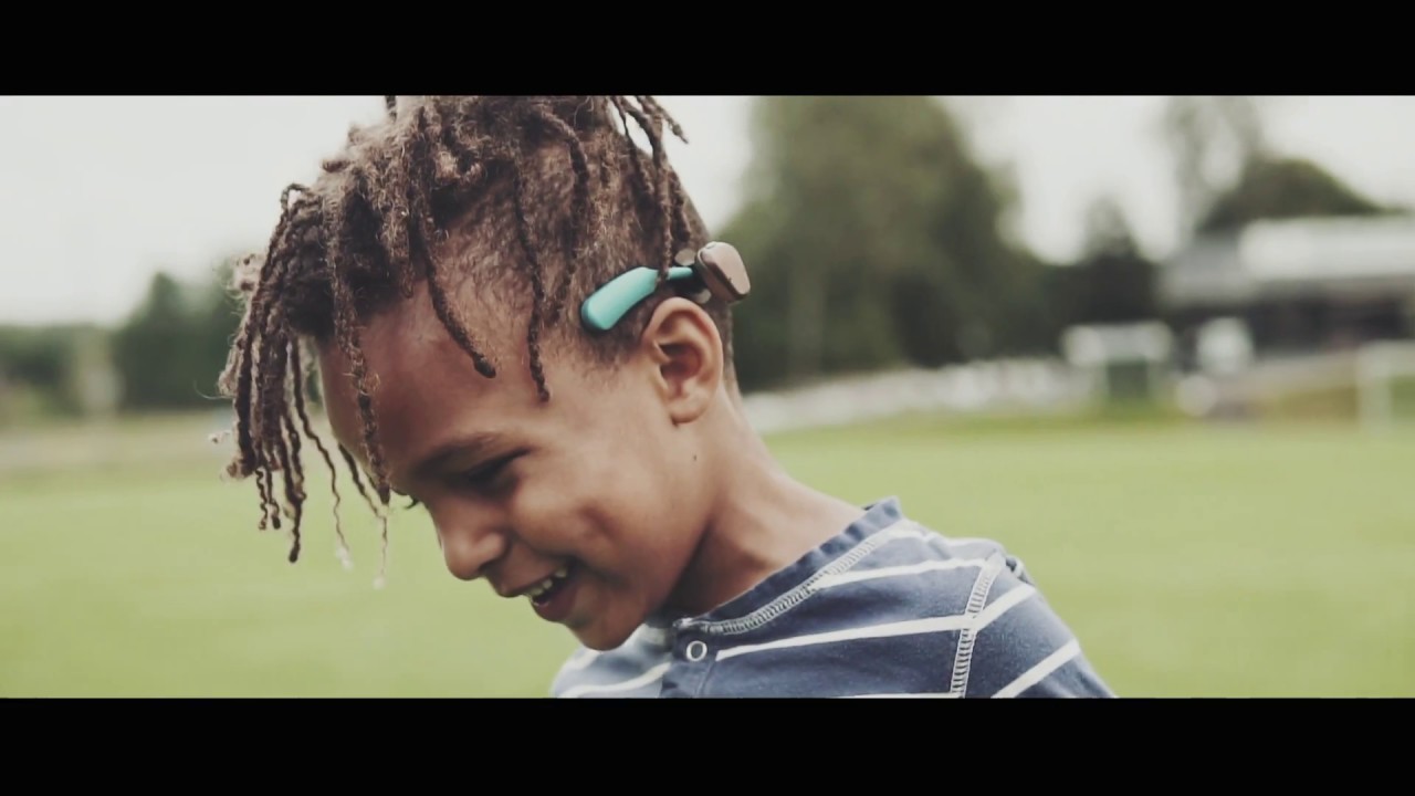 Little Boy Plays Soccer While Wearing The Cochlear™ Baha® SoundArc ...