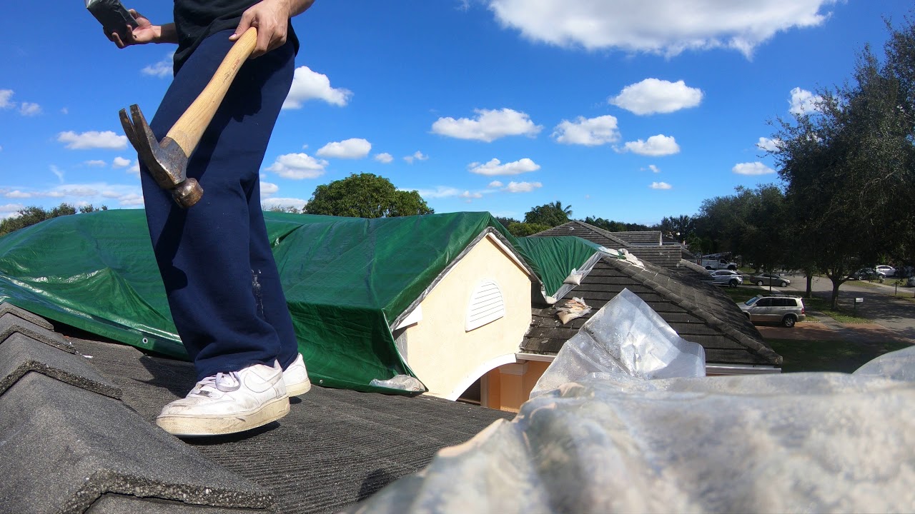 Roof tarp installation. South Florida - YouTube