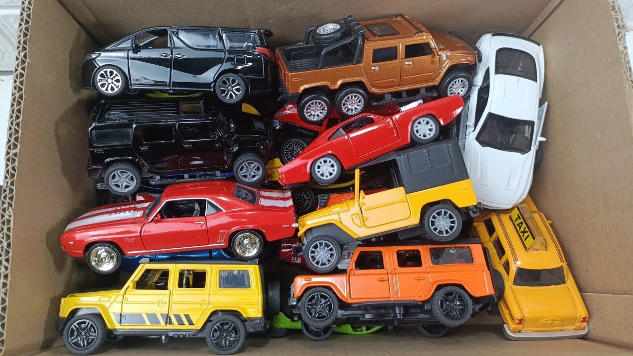 Box Full of Model Cars–Mercedes-AMG GT,Aston Martin DB11,Chevrolet ...