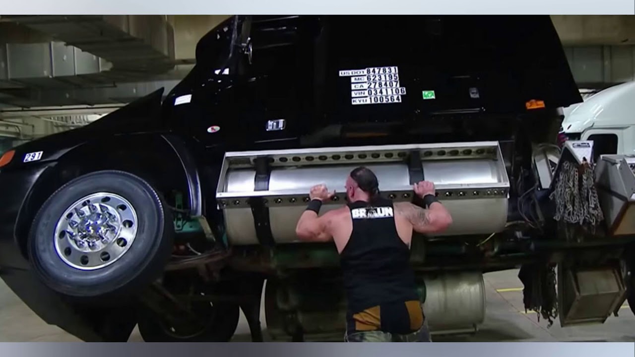 Watch WWE monster Braun Strowman flip over a big rig - YouTube