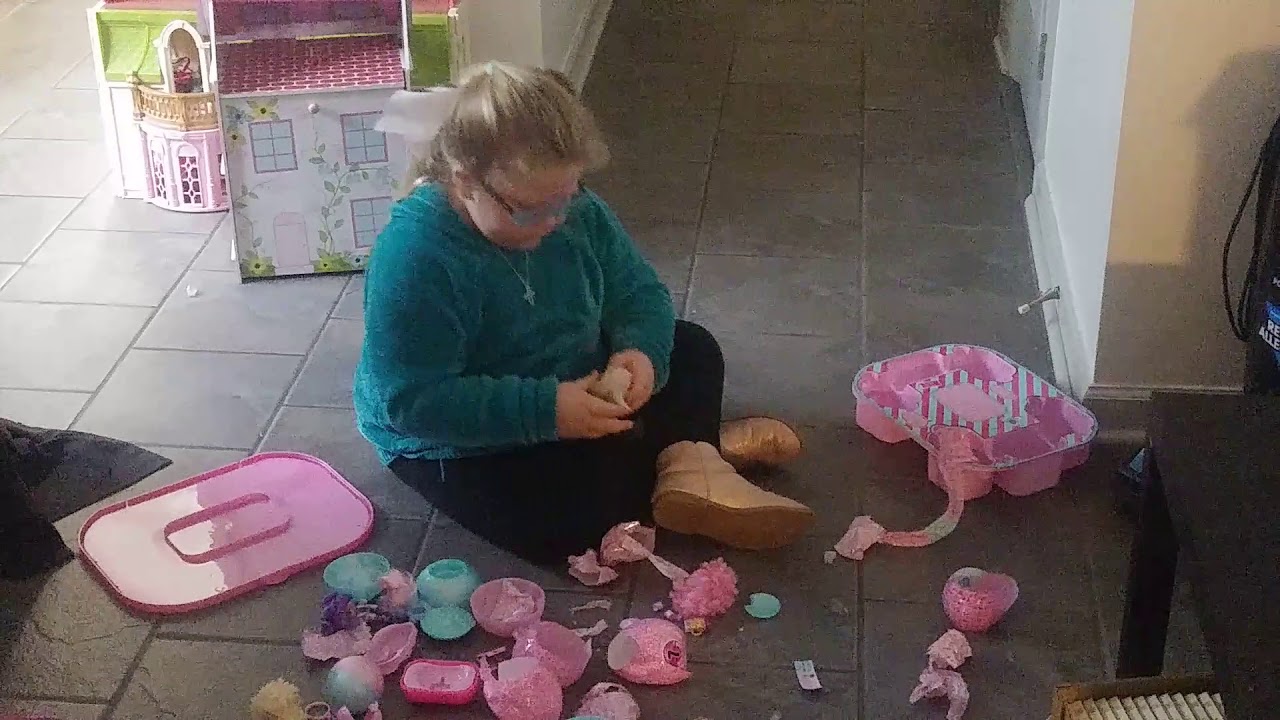 Georgia and Jessica opening LOL dolls. Oh oh oh what will they see ...