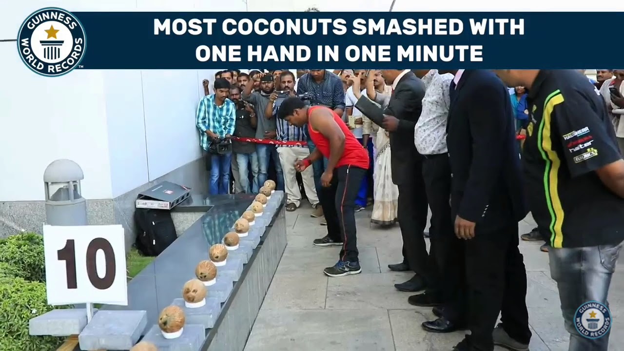 The most coconut smashed in one minute - YouTube