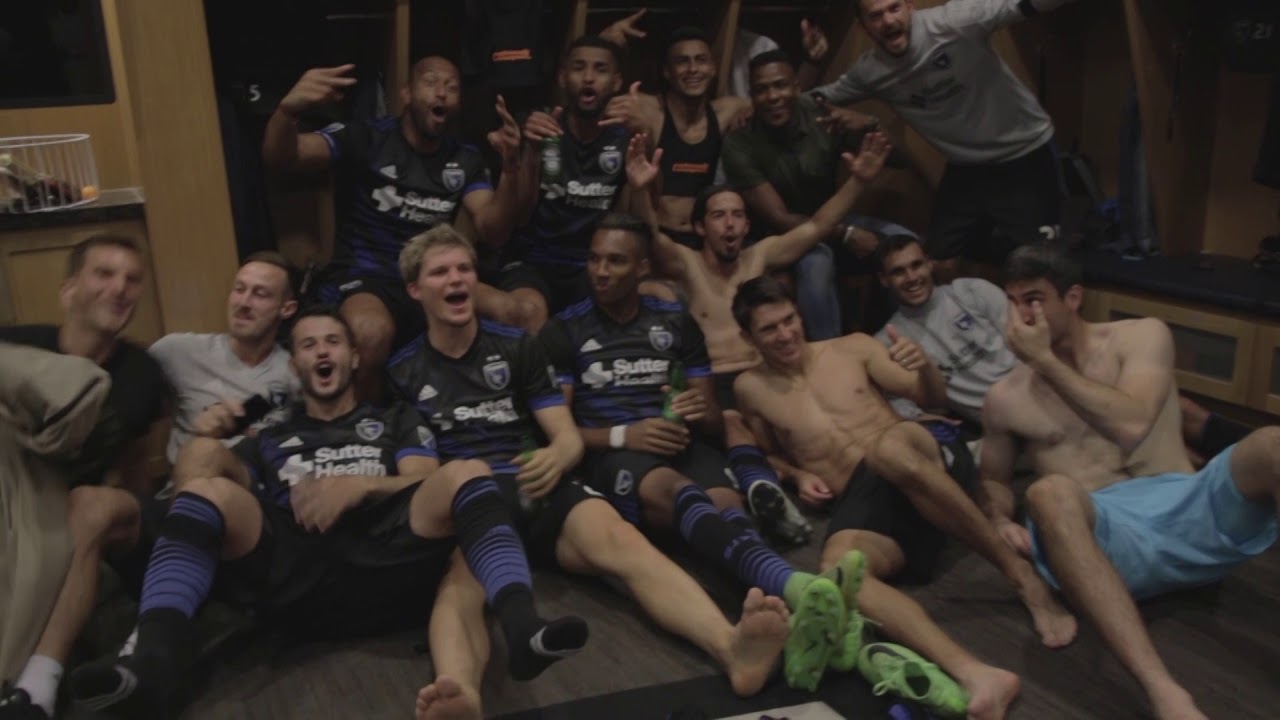 Players celebrate in the locker room after making the playoffs - YouTube