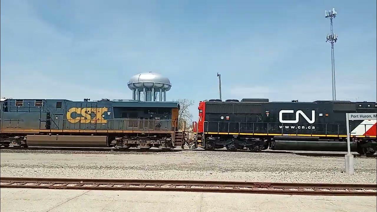 CN 3043 CN 3979 CSX 5315 CN 5410 with the door open on the CN 5410 - YouTube