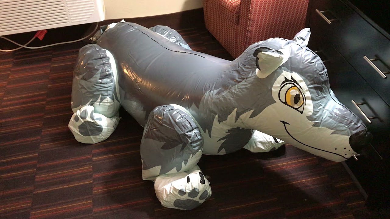 Deflating Large Inflatable Wolf! - YouTube