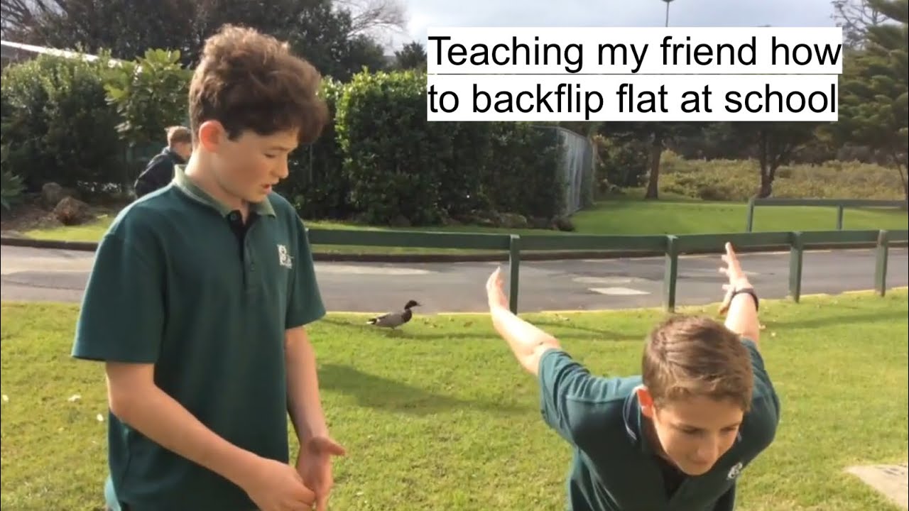 Teaching my friend a backflip flat in 5 minutes at school - YouTube