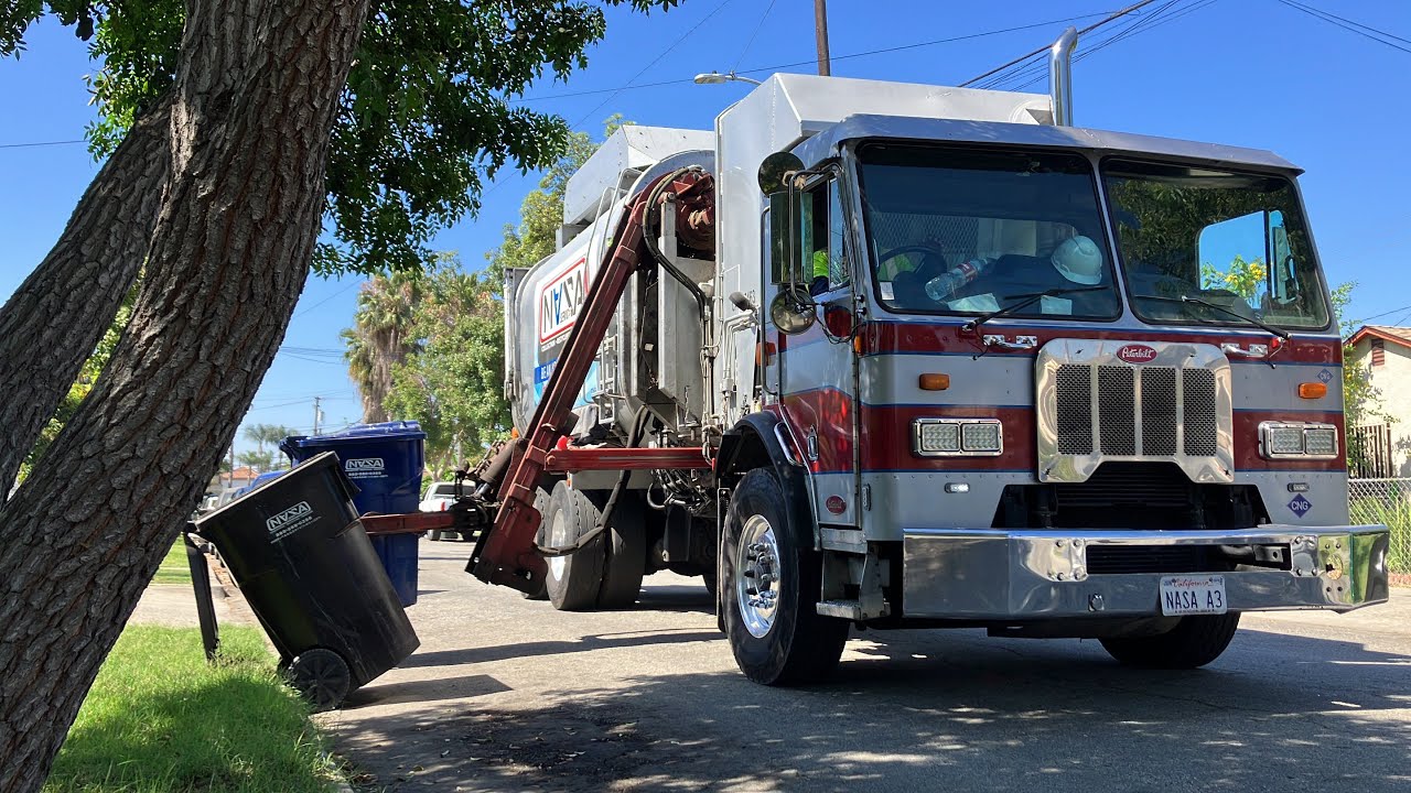 NASA services garbage truck on recycling - YouTube