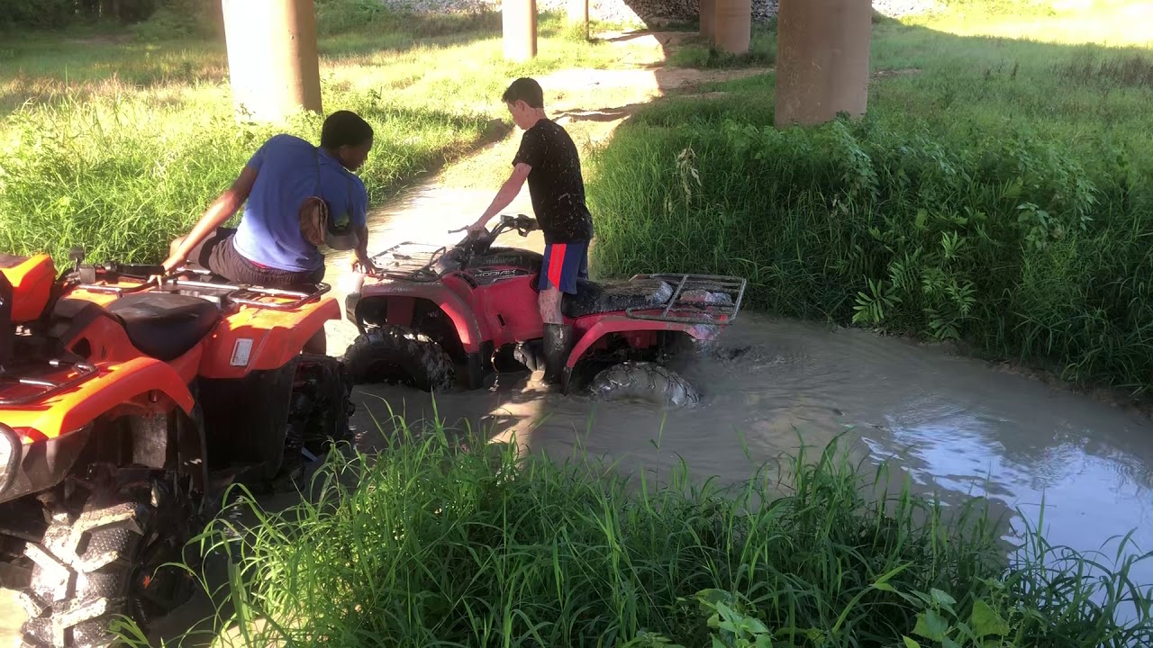 Isaac and Tyler having a little mudding fun - YouTube