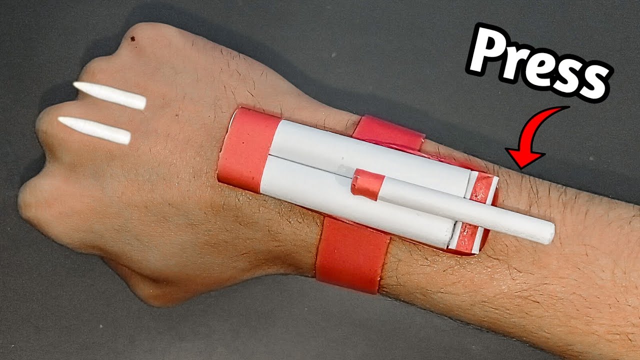Paper wrist gun that shoots paper bullets | How to make a paper gun ...