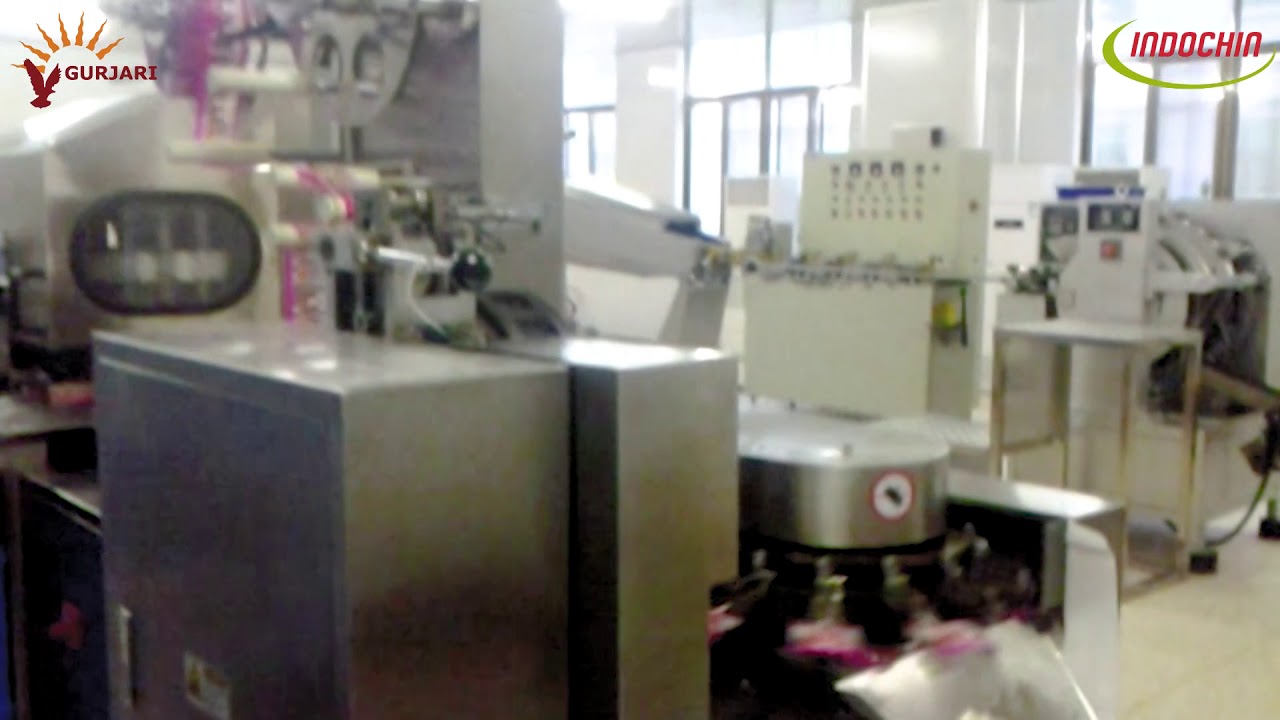 Flat Lollipop Forming and Packing Line - YouTube