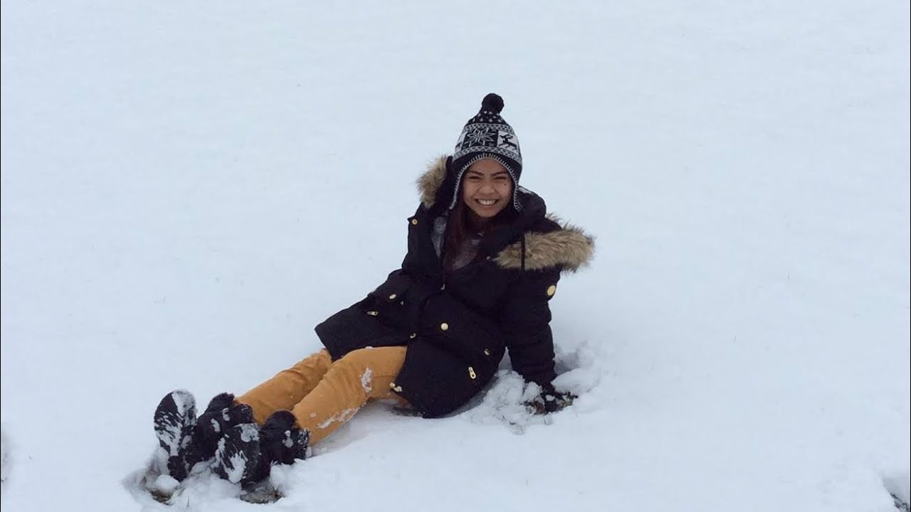 Her first snow experience - YouTube