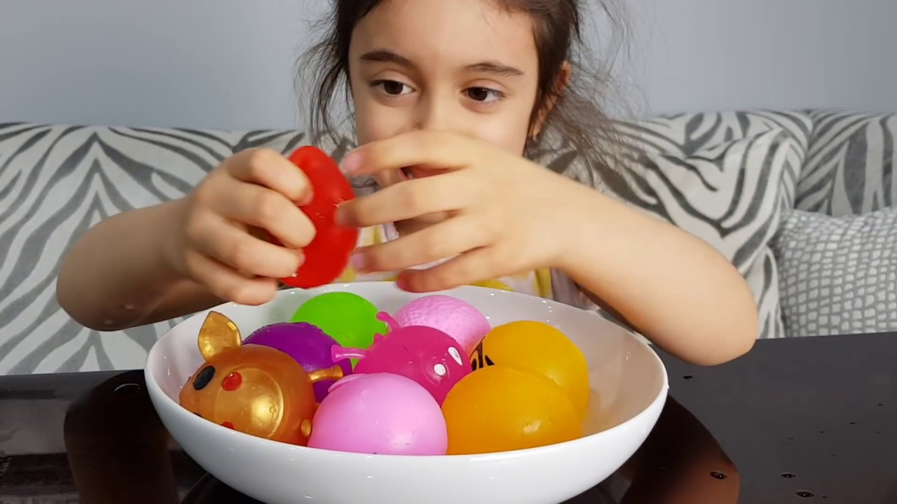 Emily Playing with Colored Water Balls - YouTube