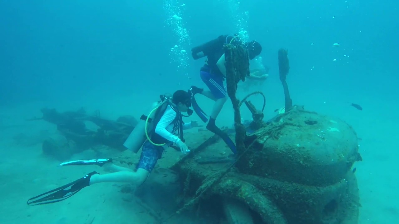 Leisure diving - Is that a truck and a bus? UNDERWATER? - YouTube