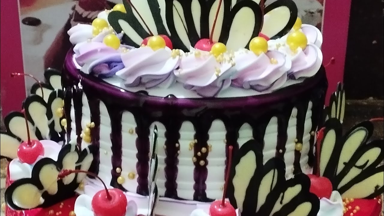 two tier chocolate cake|| double Manjil cake decoration ...
