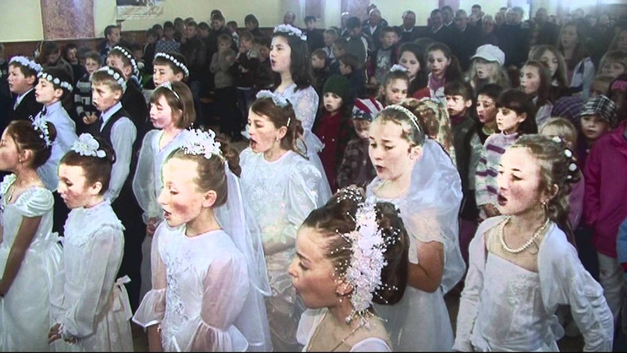 Prima Sf Impartasanie - YouTube