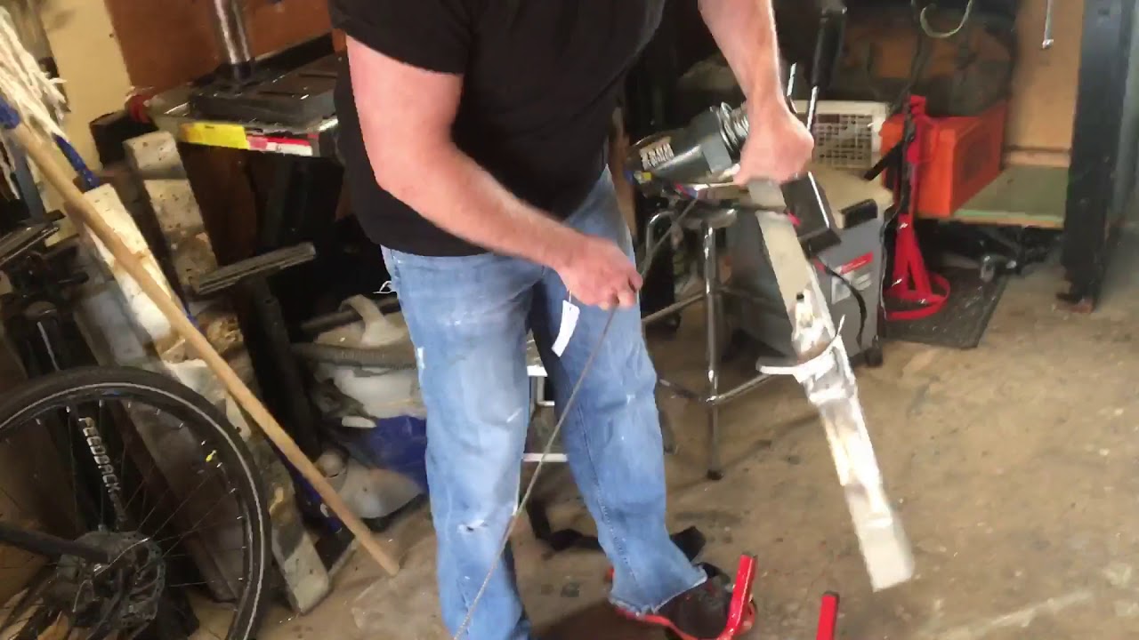 Winch loading a motorcycle onto a harbor freight lift - YouTube