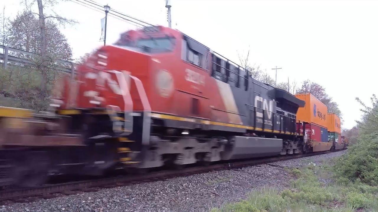 Fairly Short Stack Train CN 121 w/DPU Rolling thru Bedford, NS - YouTube