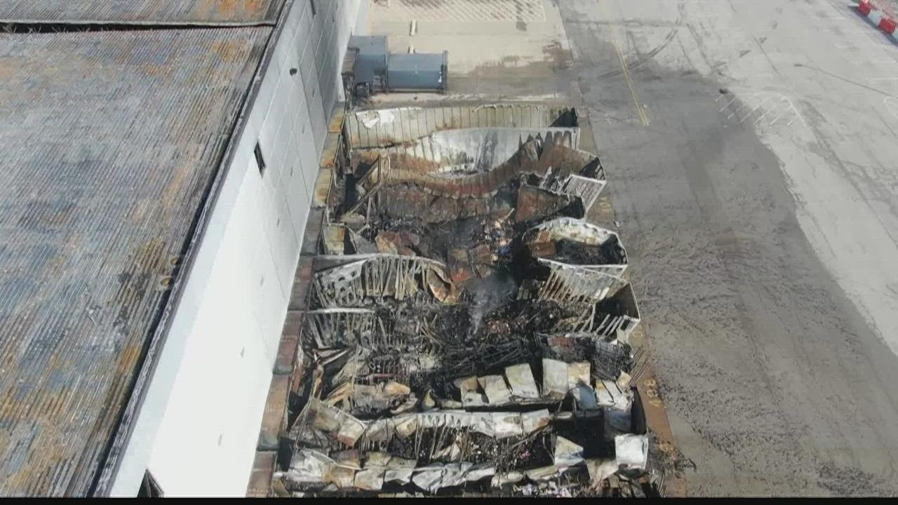 Smoke clears, showing damage from fire at Walmart warehouse - YouTube