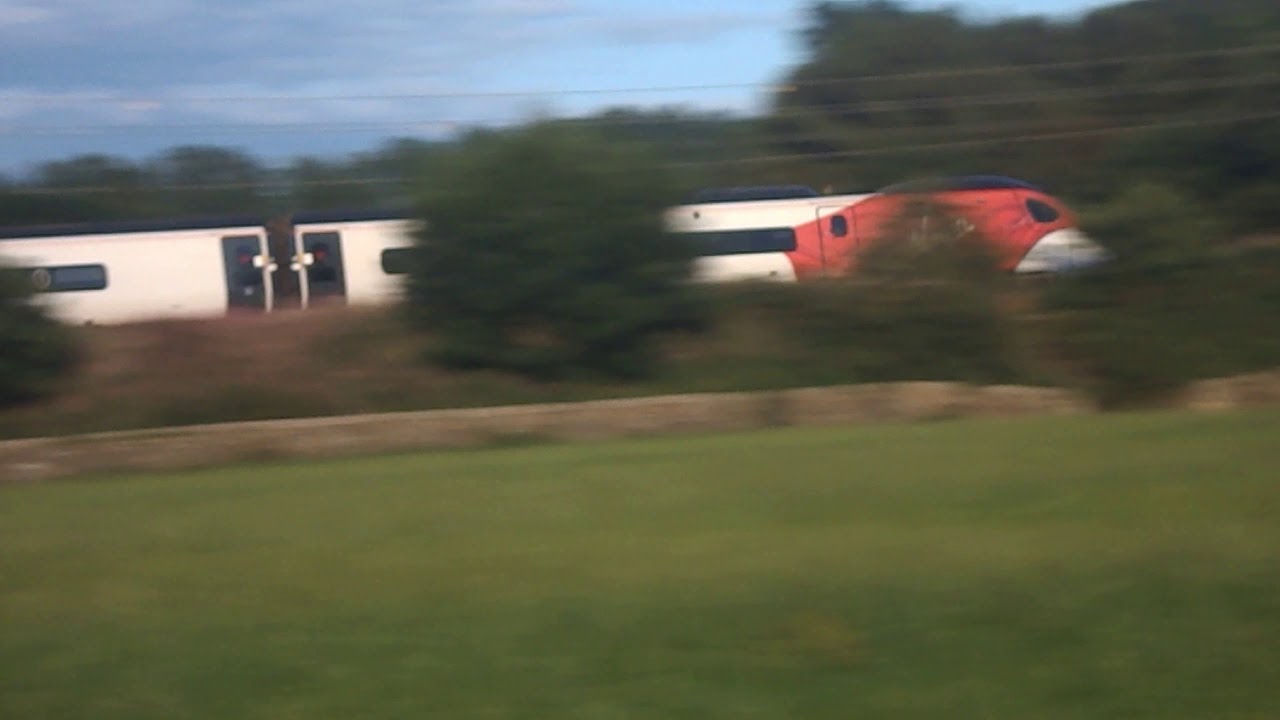 Two trains passing - YouTube