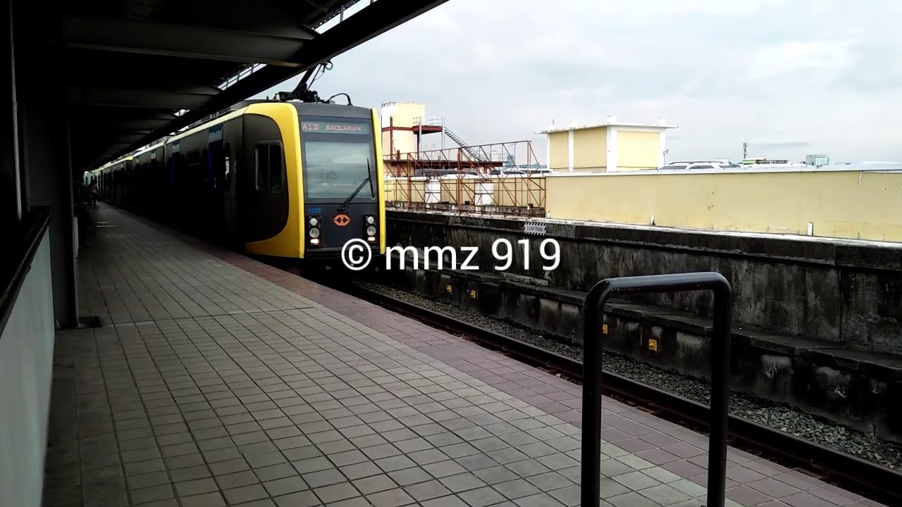 LRT-1/LRMC 3rd Generation (3G) train in 3 car formation arriving ...