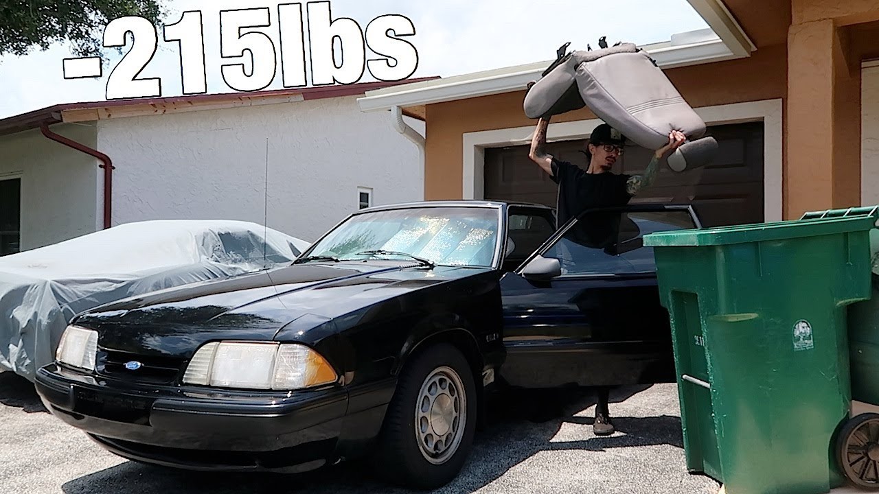 GUTTING A FOX BODY IN 10 MINUTES - YouTube