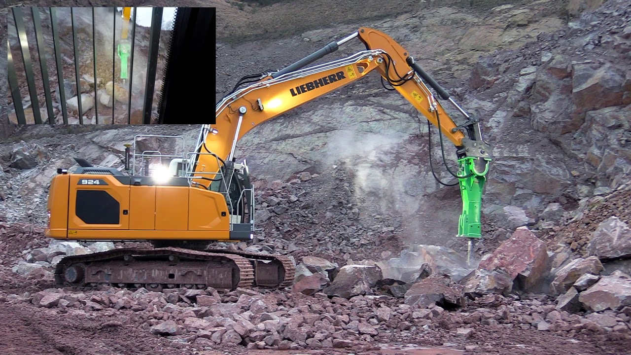 Montabert V1800 Breaker in action - YouTube