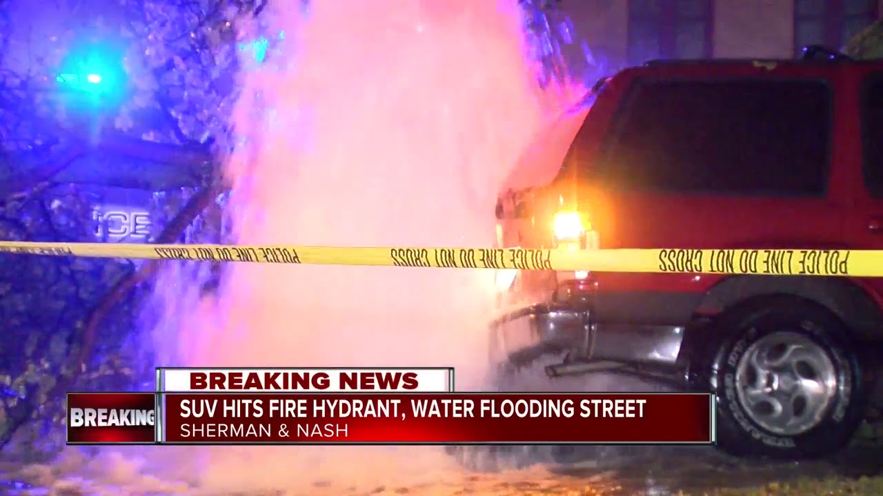 Fire hydrant crash causes street flooding on north side - YouTube