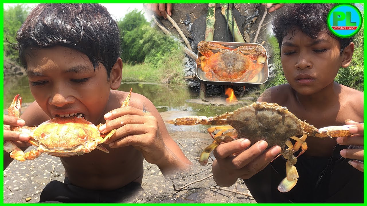 Primitive Technology-A Young Boy Cooking A Crab And Eating At The Bank ...