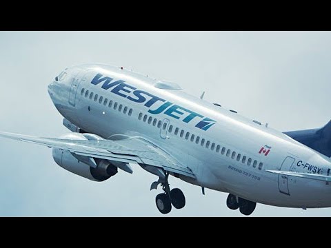 WestJet Airways Airbus A320 Landing at EGLC London City Airport ...
