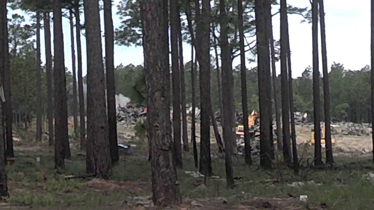 Demo shot, removing a "Law" rocket UXO hazard. - YouTube