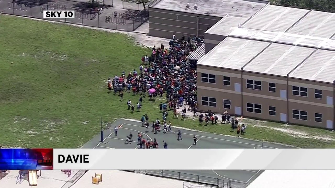 Students evacuate Indian Ridge Middle School in Davie - YouTube