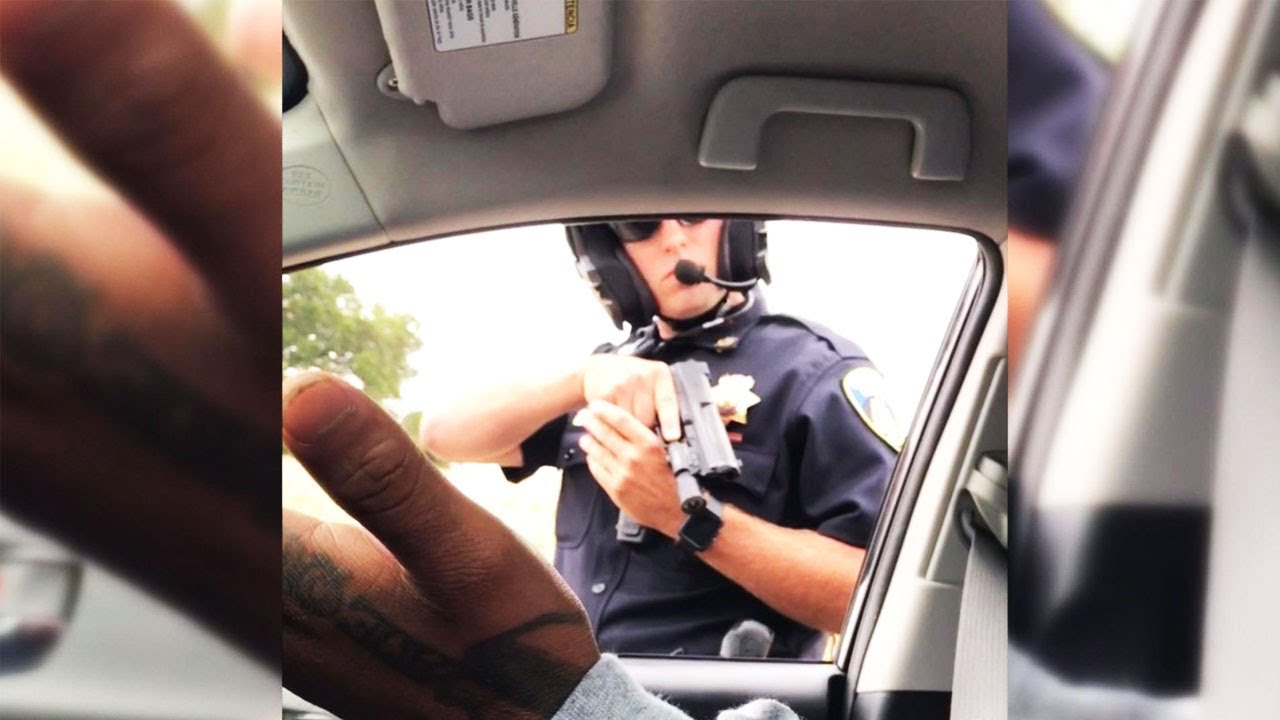 Cop Won't Stop Pointing Gun At Passenger (VIDEO) - YouTube